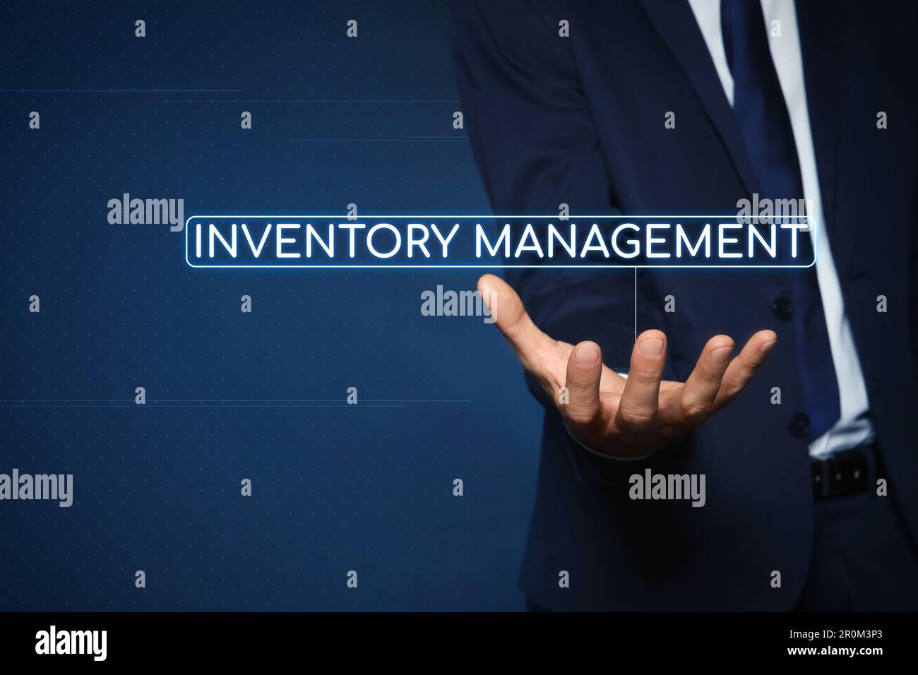 Man touching virtual screen with text Inventory Management on color ...