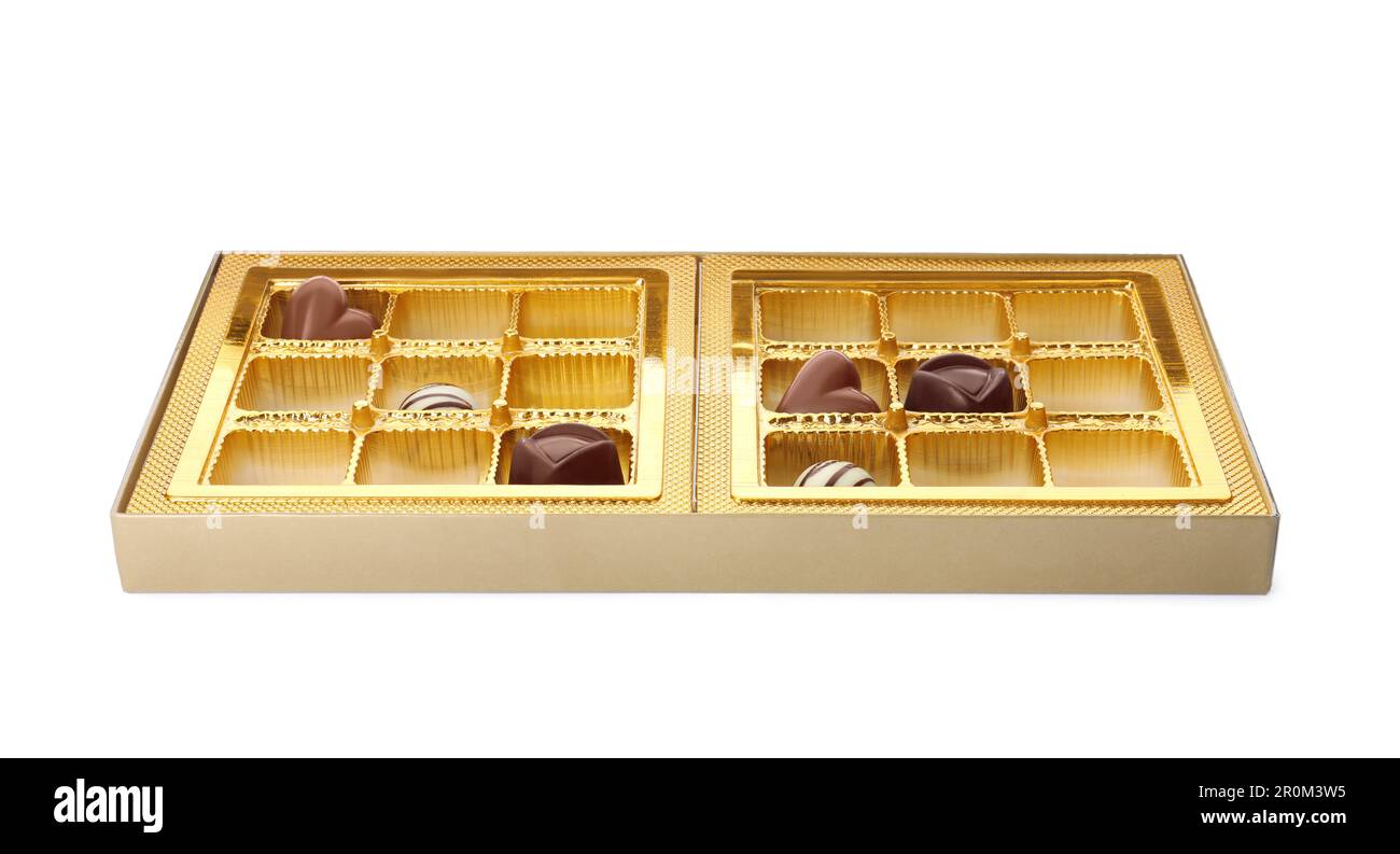 Partially empty box of chocolate candies isolated on white Stock Photo - Alamy