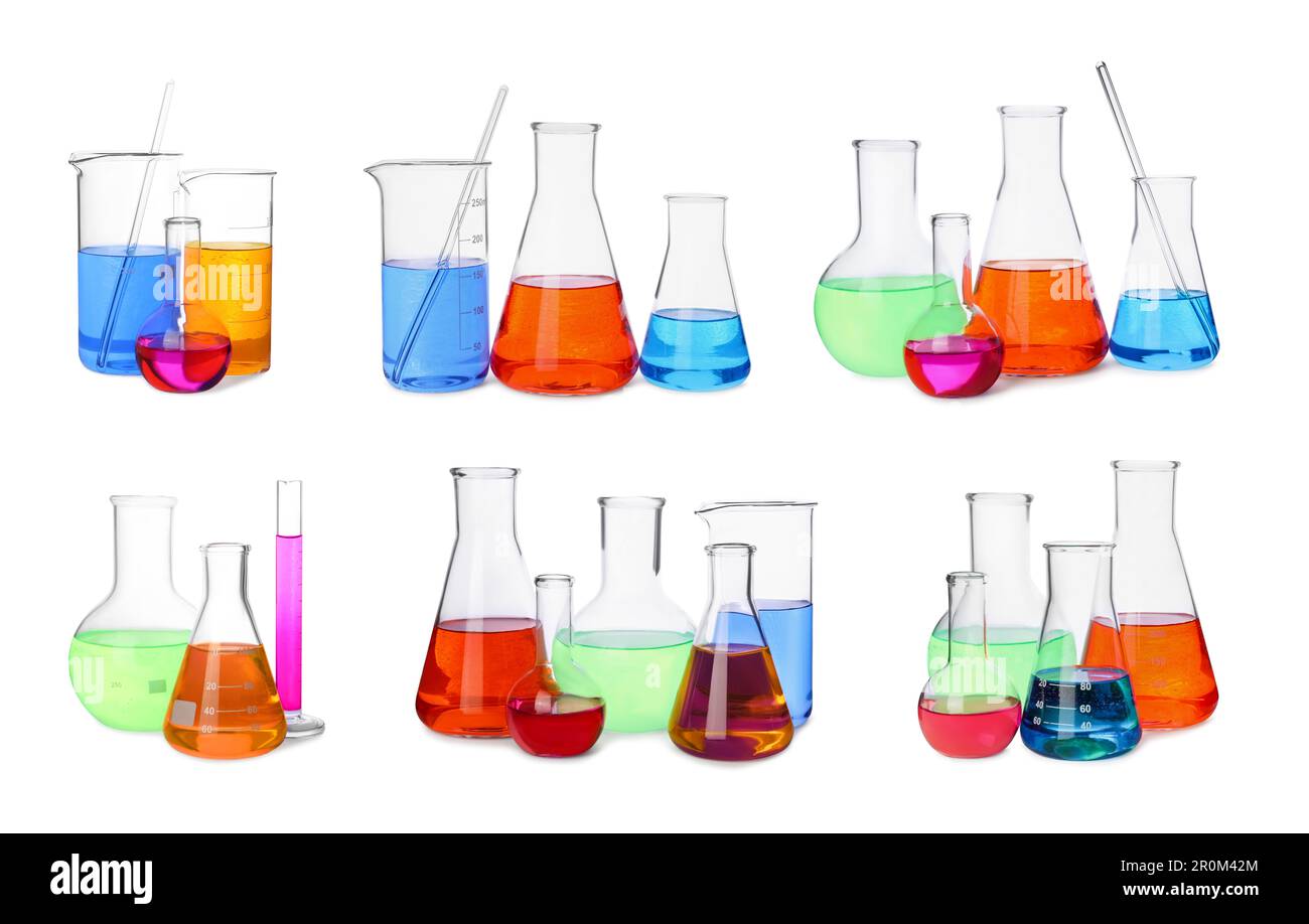 Set of different laboratory glassware with colorful liquids on white ...