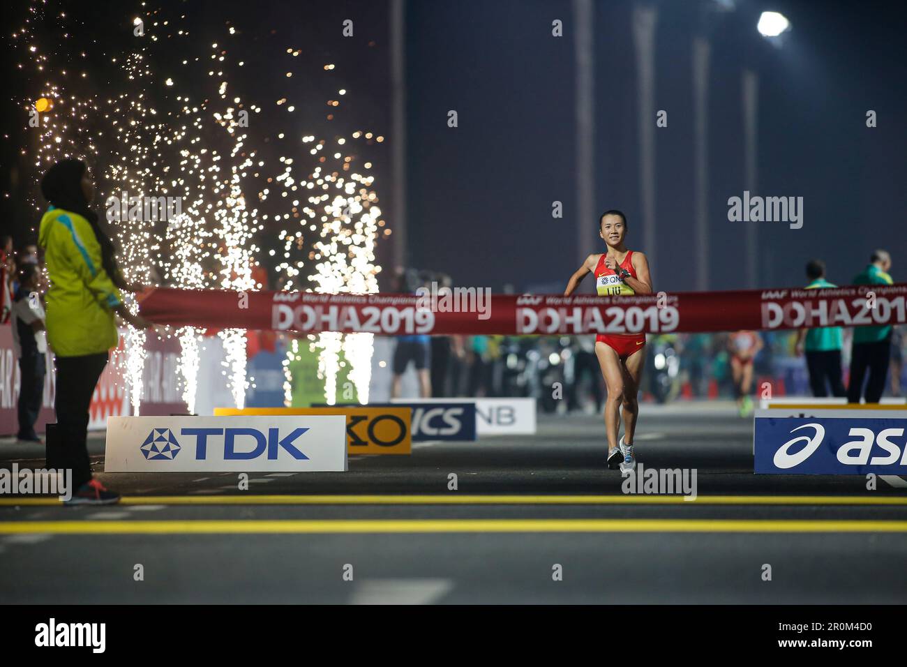 Hong LIU running the 20 Kilometres Race Walk at the 2019 World ...