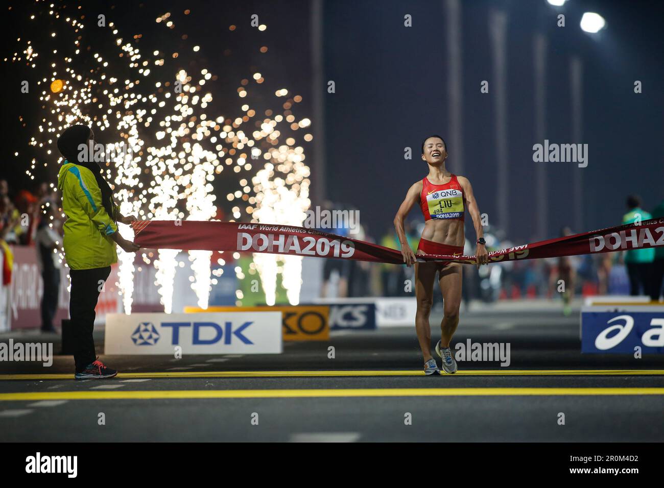 Hong LIU running the 20 Kilometres Race Walk at the 2019 World ...