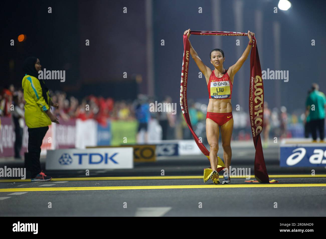 Hong LIU running the 20 Kilometres Race Walk at the 2019 World ...