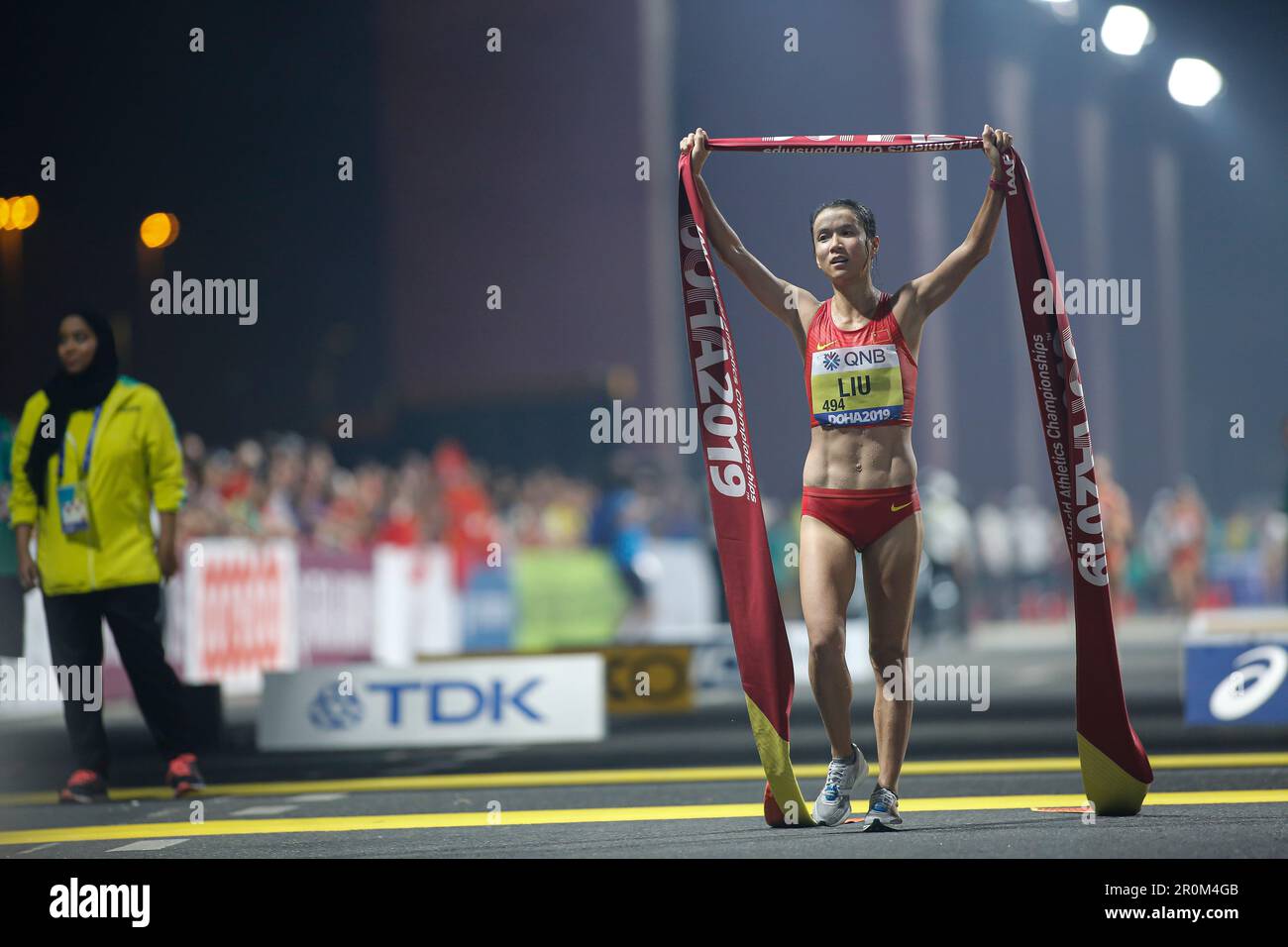 Hong LIU running the 20 Kilometres Race Walk at the 2019 World ...