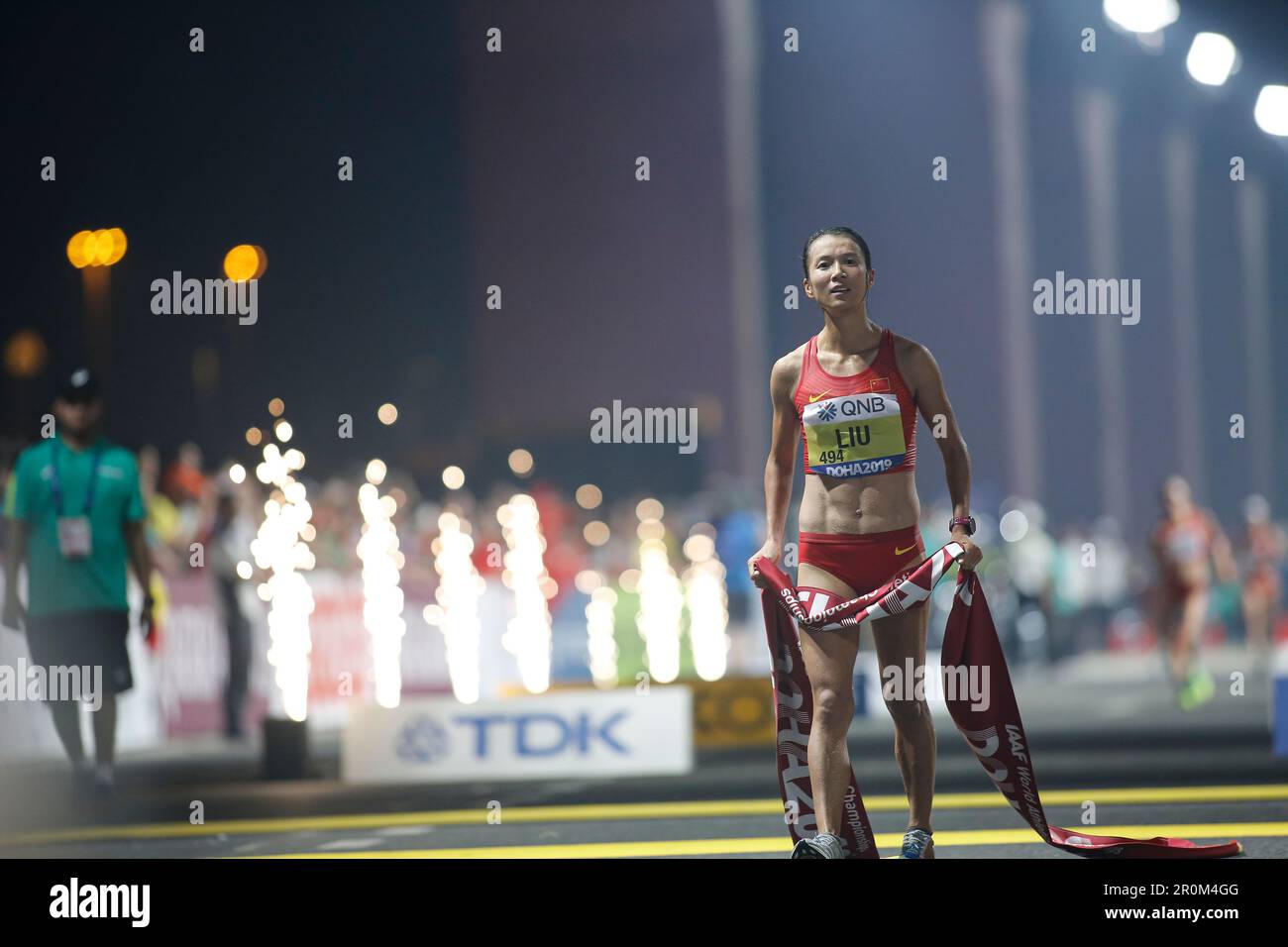 Hong LIU running the 20 Kilometres Race Walk at the 2019 World ...