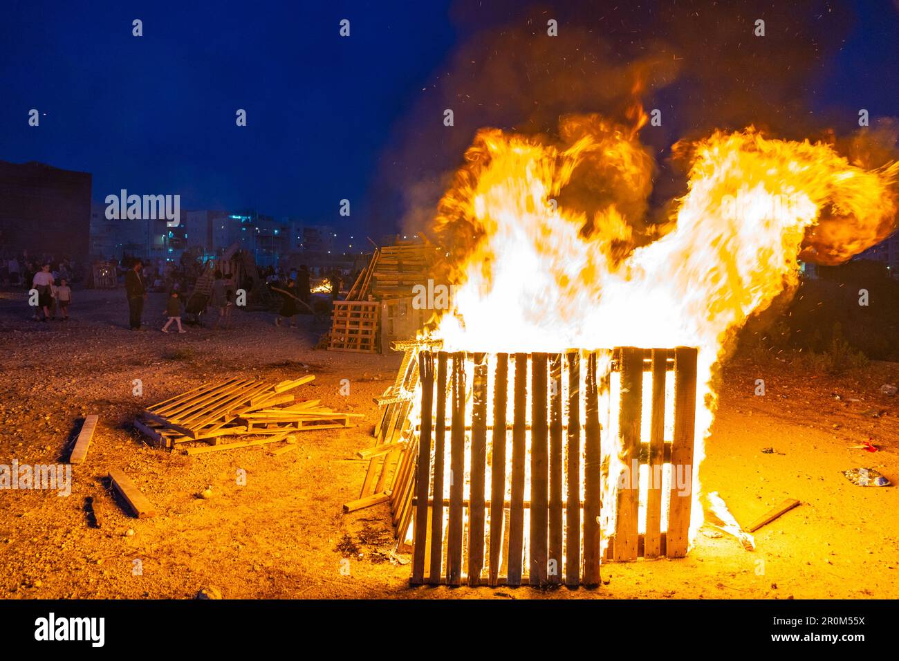 People making fires during the Jewish Holiday of Lag Ba'Omer, which ...