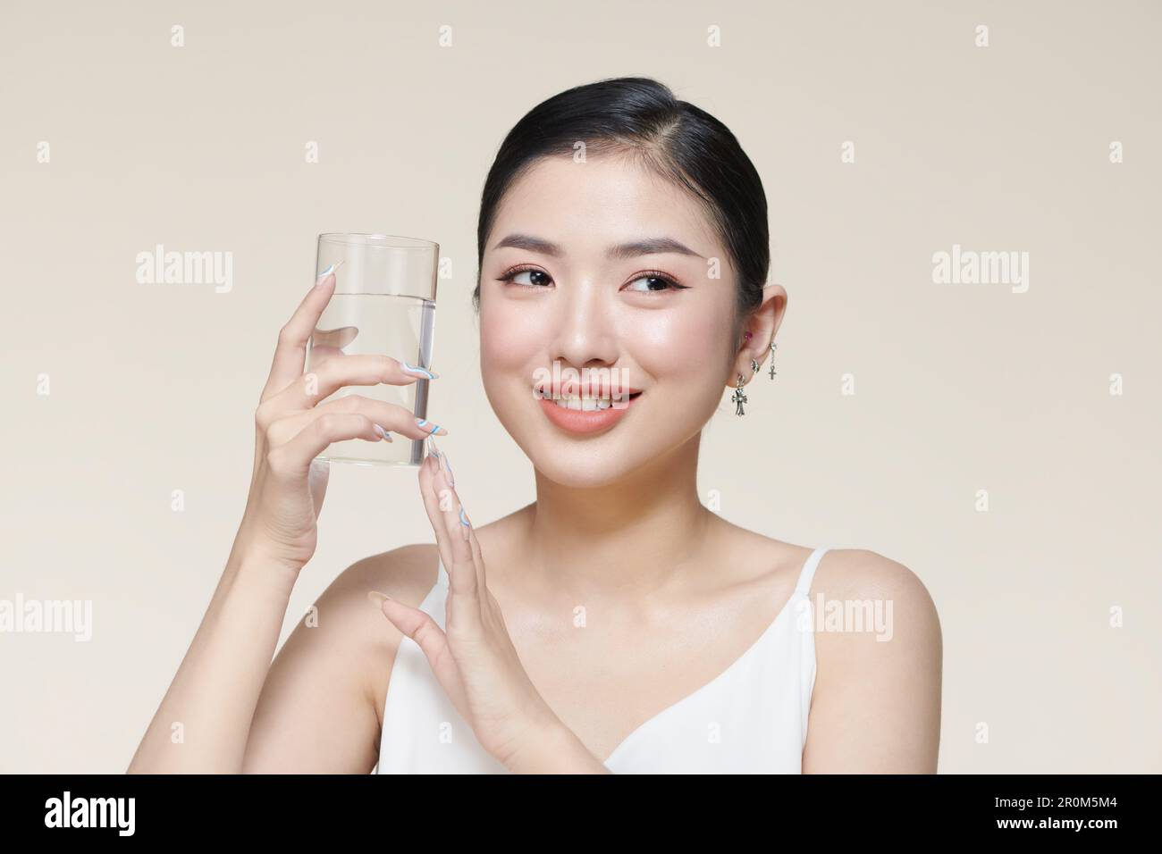 Pretty young woman drinking water hi-res stock photography and images - Alamy