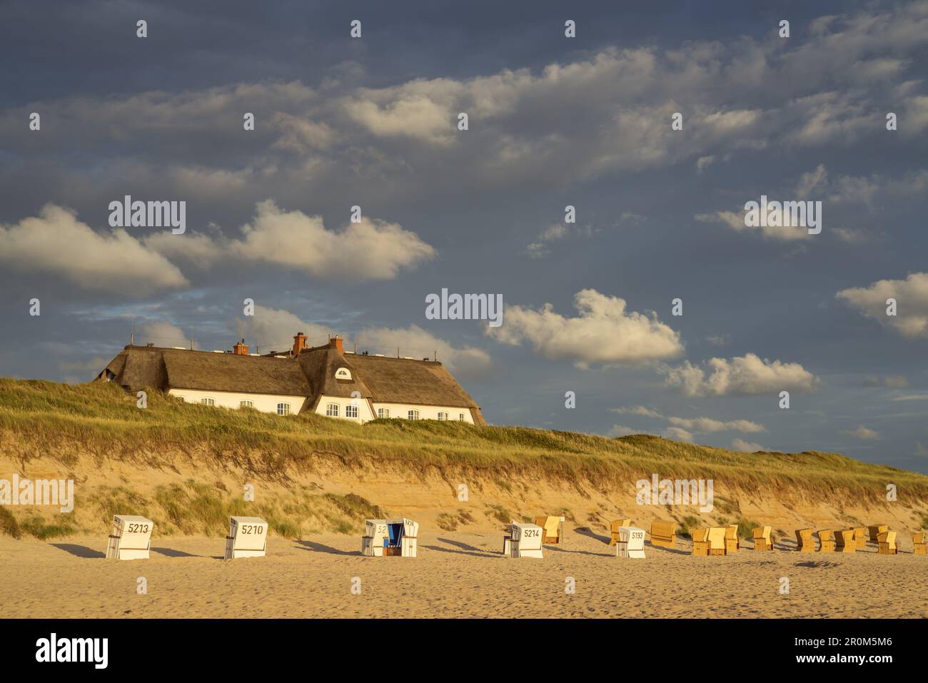 Stormy weather at the beach with view of the hotel of Söl'ring Hof in ...