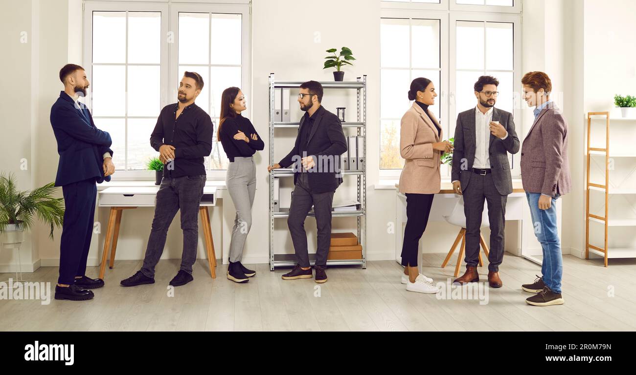 Group happy colleagues communicating hi-res stock photography and ...