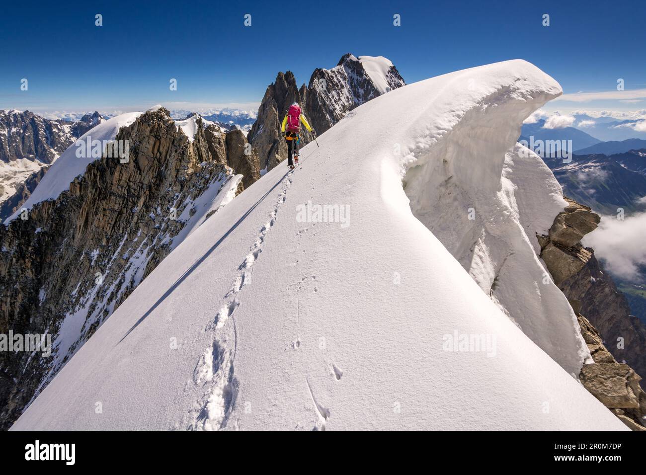 Climbers at a crosswalk, ridge at Dome de Rochefort, Grandes Jorasses ...