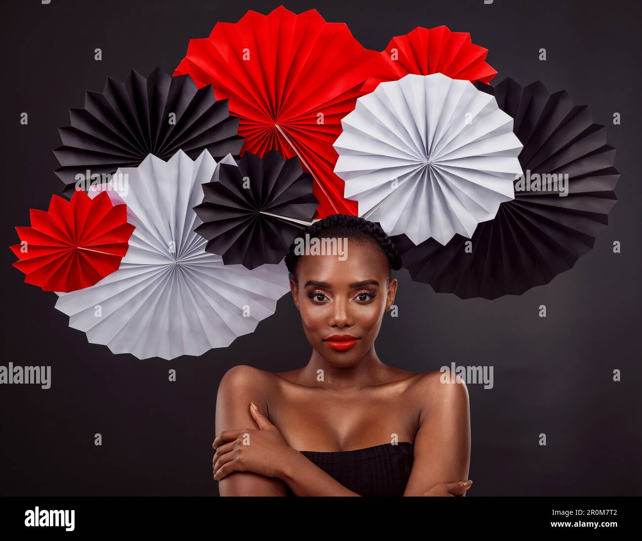 Origami fans, portrait and a black woman for culture isolated on a ...