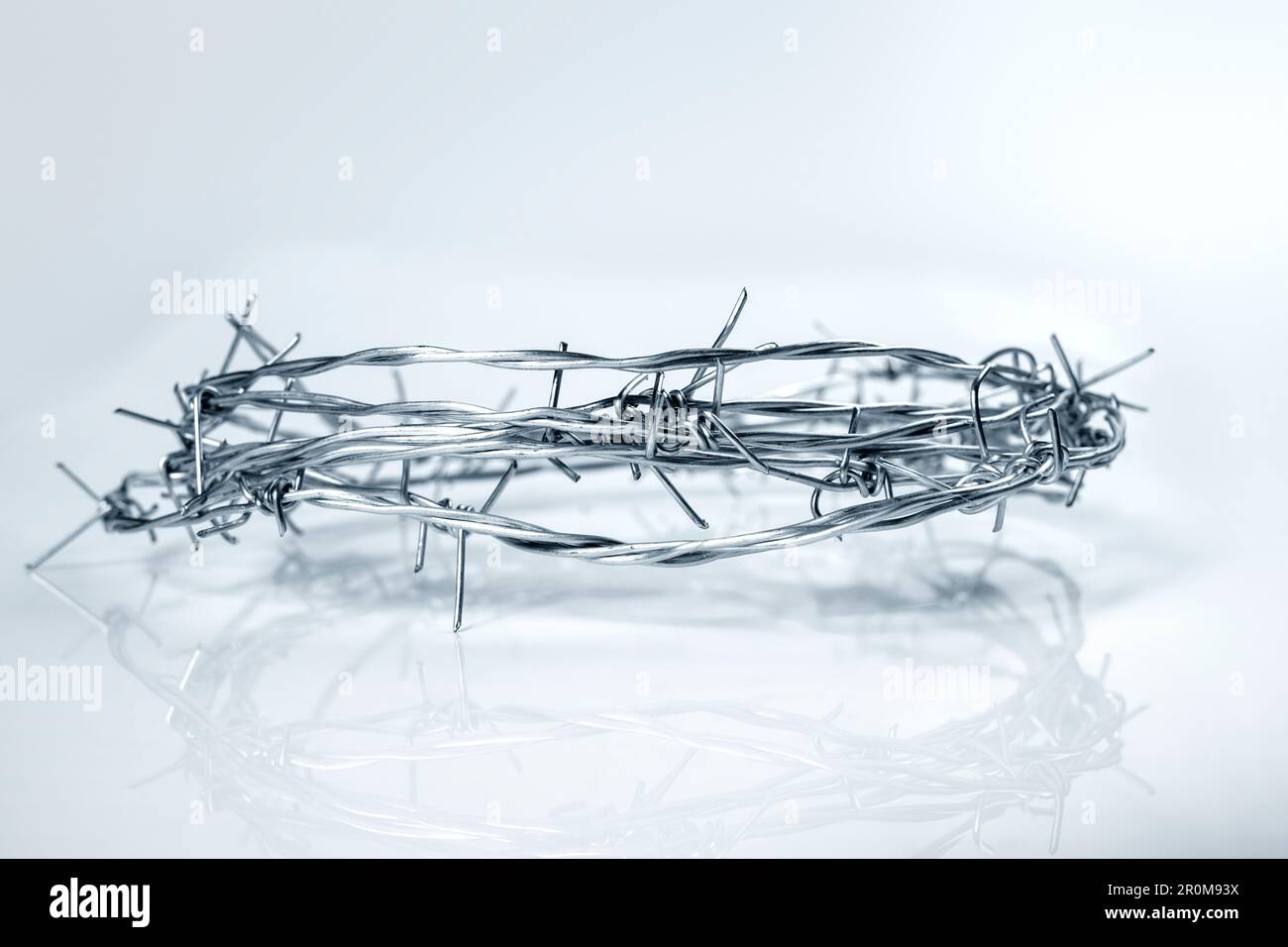 Barbed wire on white background Stock Photo - Alamy