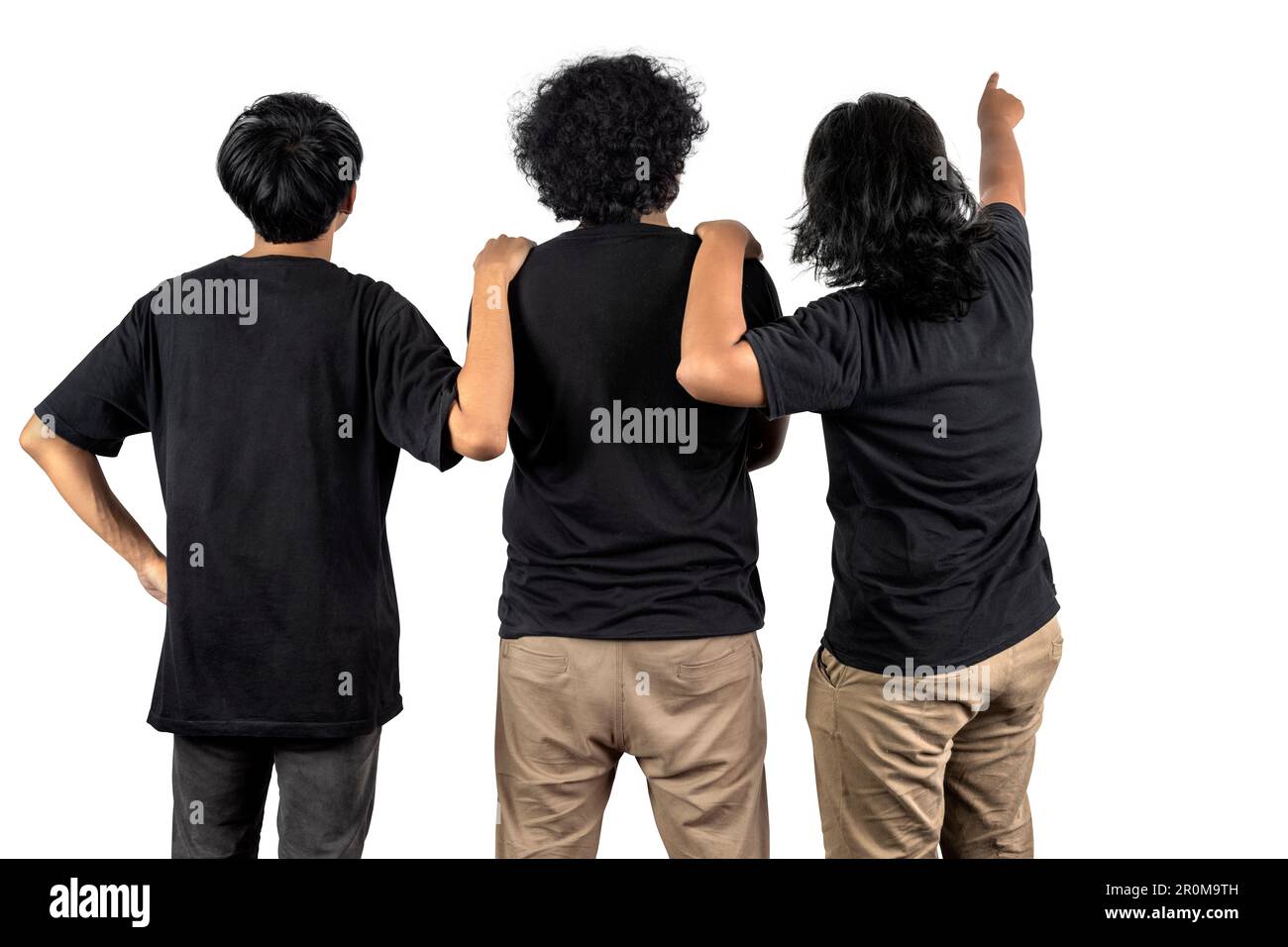 Rear view of three men standing isolated over white background Stock ...