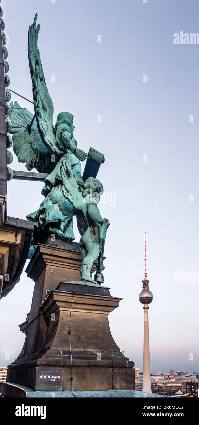 Angel sculpture at the Berliner Dom, Alex Fernsehturm, Berlin Stock ...