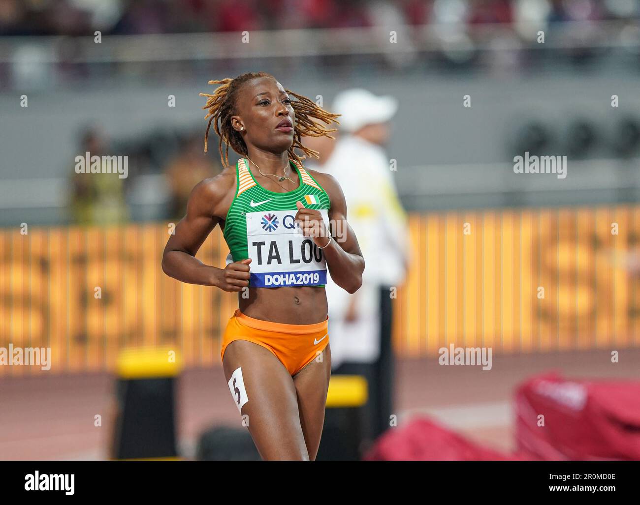 Marie-Josée Ta Lou running the 100m at the 2019 World Athletics ...