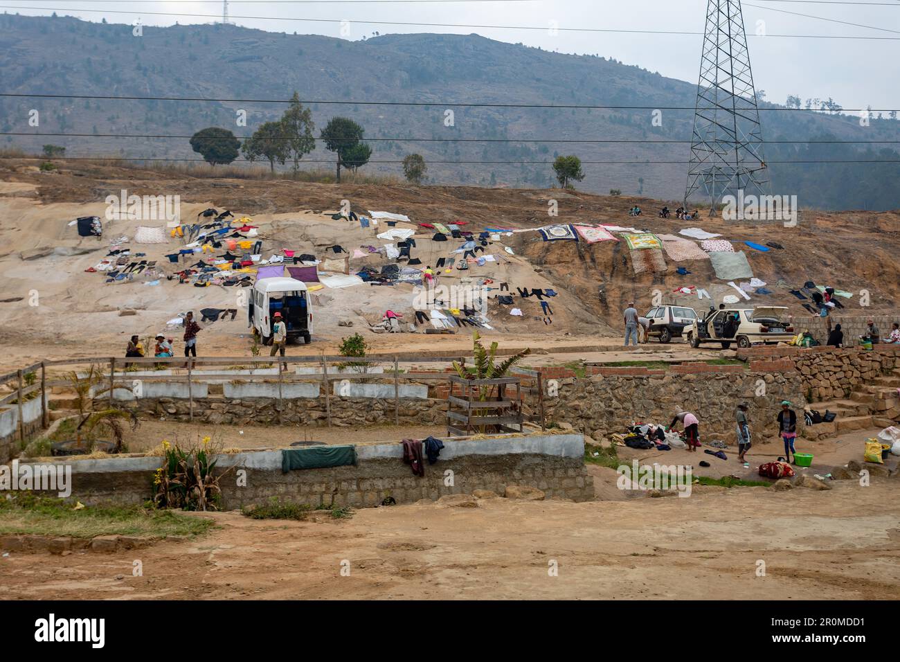 Akamasoa, Madagascar - October 28, 2022: Malagasy people dry their ...