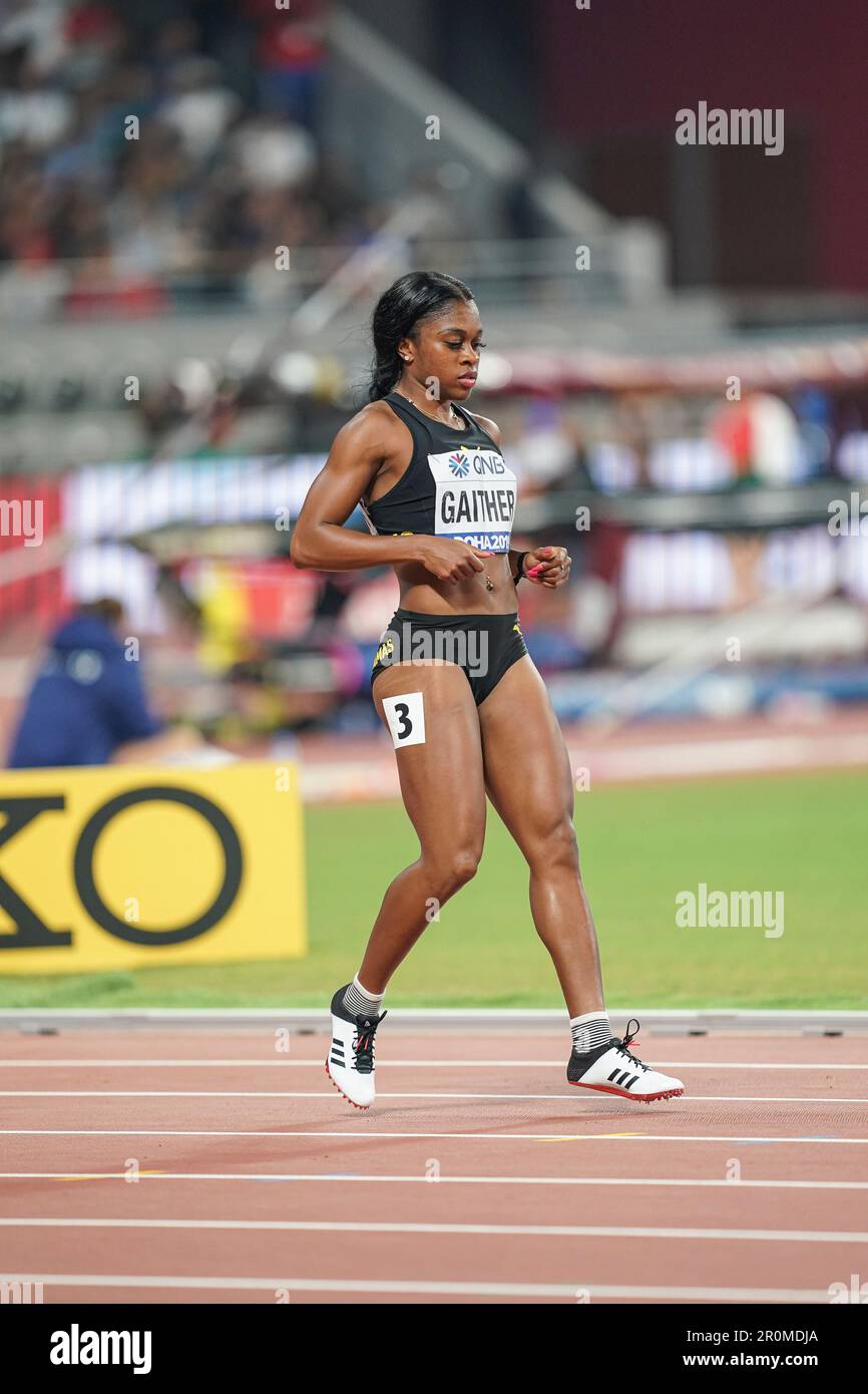 Tynia Gaither running the 100m at the 2019 World Athletics ...