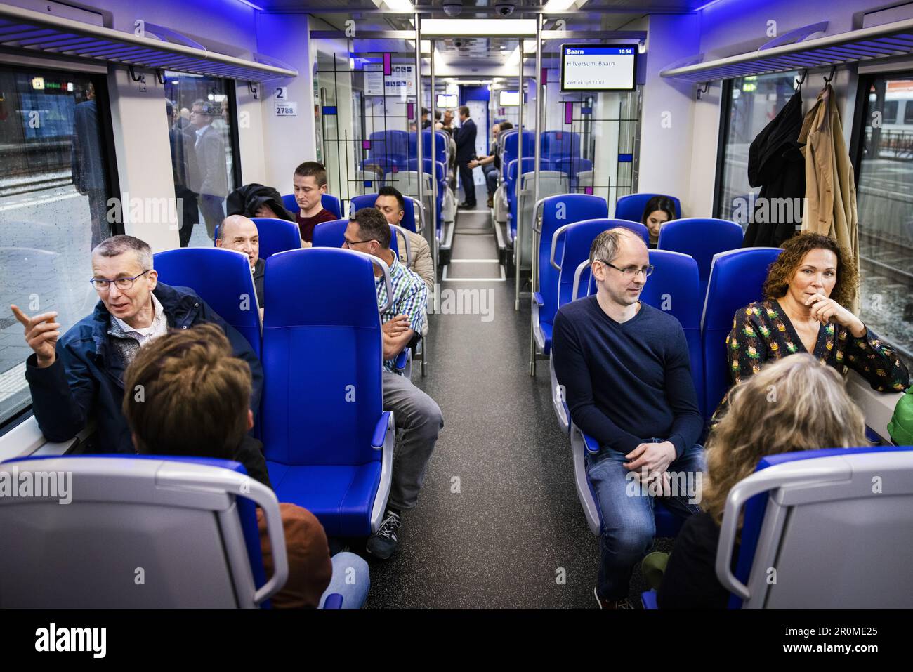AMSTERDAM - Travelers in the new Sprinter at Amsterdam Central. A total ...