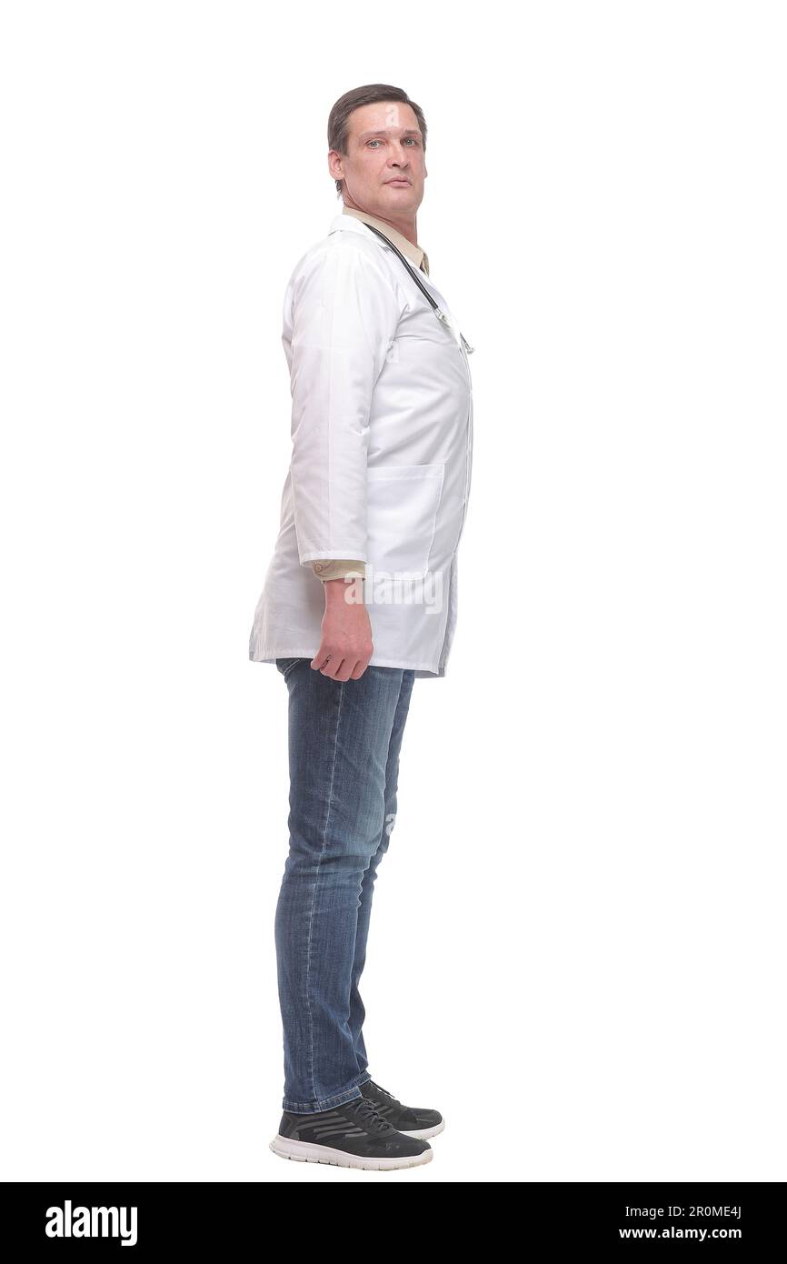 Side view full length confident male medical doctor in uniform looking ...