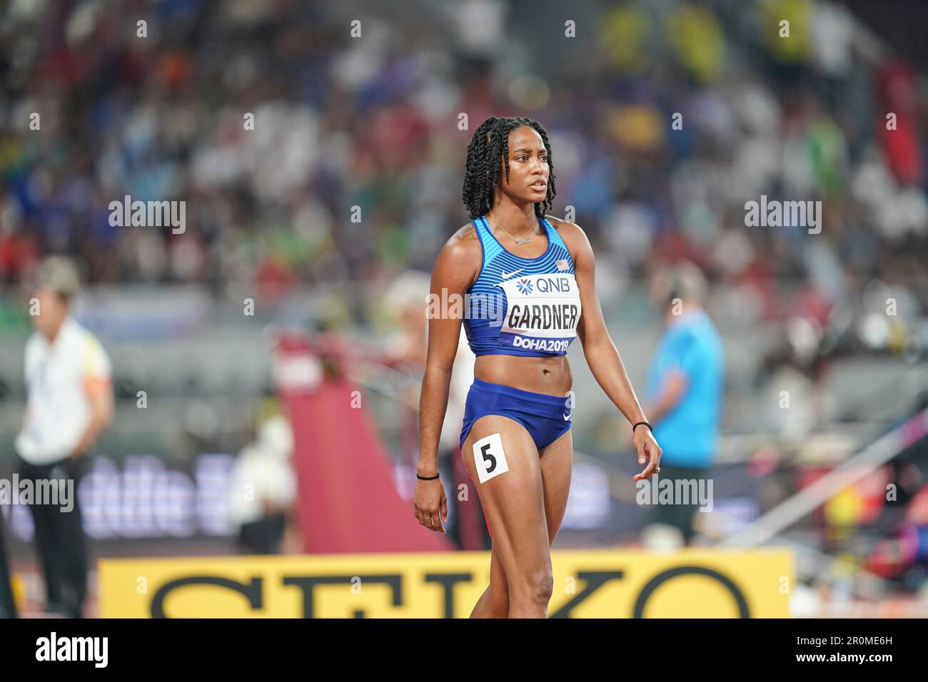 English Gardner running the 100m at the 2019 World Athletics ...
