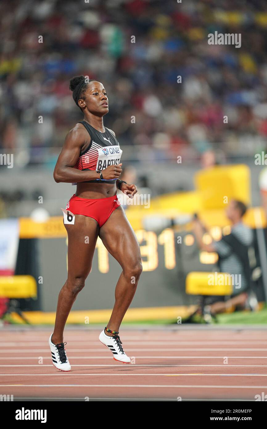 Kelly-Ann Baptiste running the 100m at the 2019 World Athletics ...