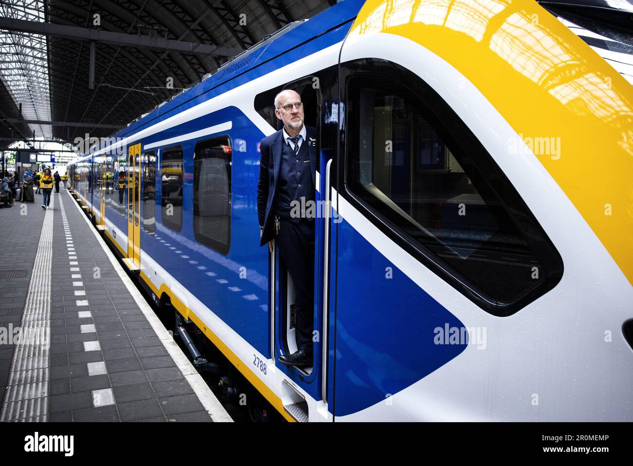 AMSTERDAM - The driver of the new Sprinter at Amsterdam Central. A ...