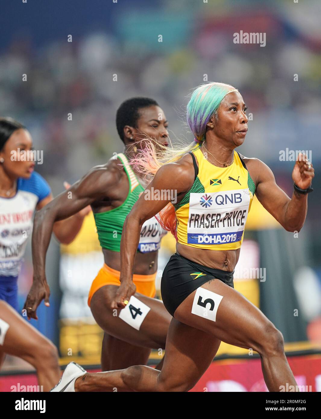 Shelly-Ann Fraser-Pryce running the 100m at the 2019 World Athletics ...