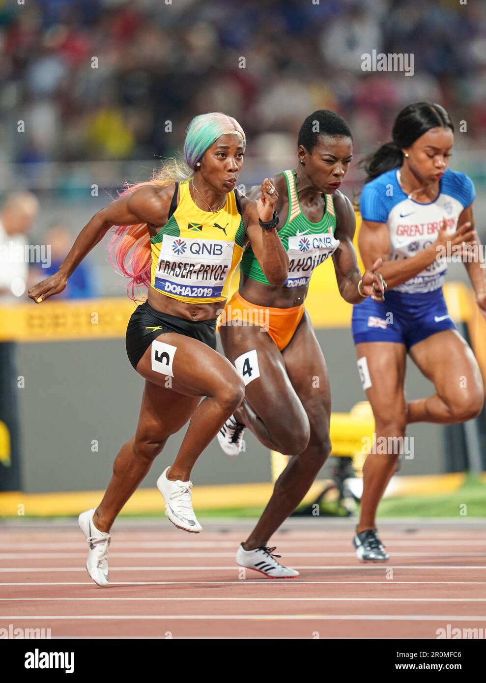 Shelly-Ann Fraser-Pryce running the 100m at the 2019 World Athletics ...