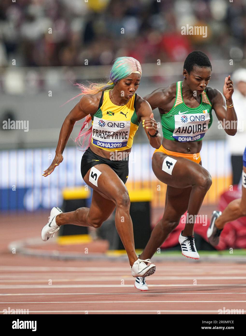 Shelly-Ann Fraser-Pryce running the 100m at the 2019 World Athletics ...
