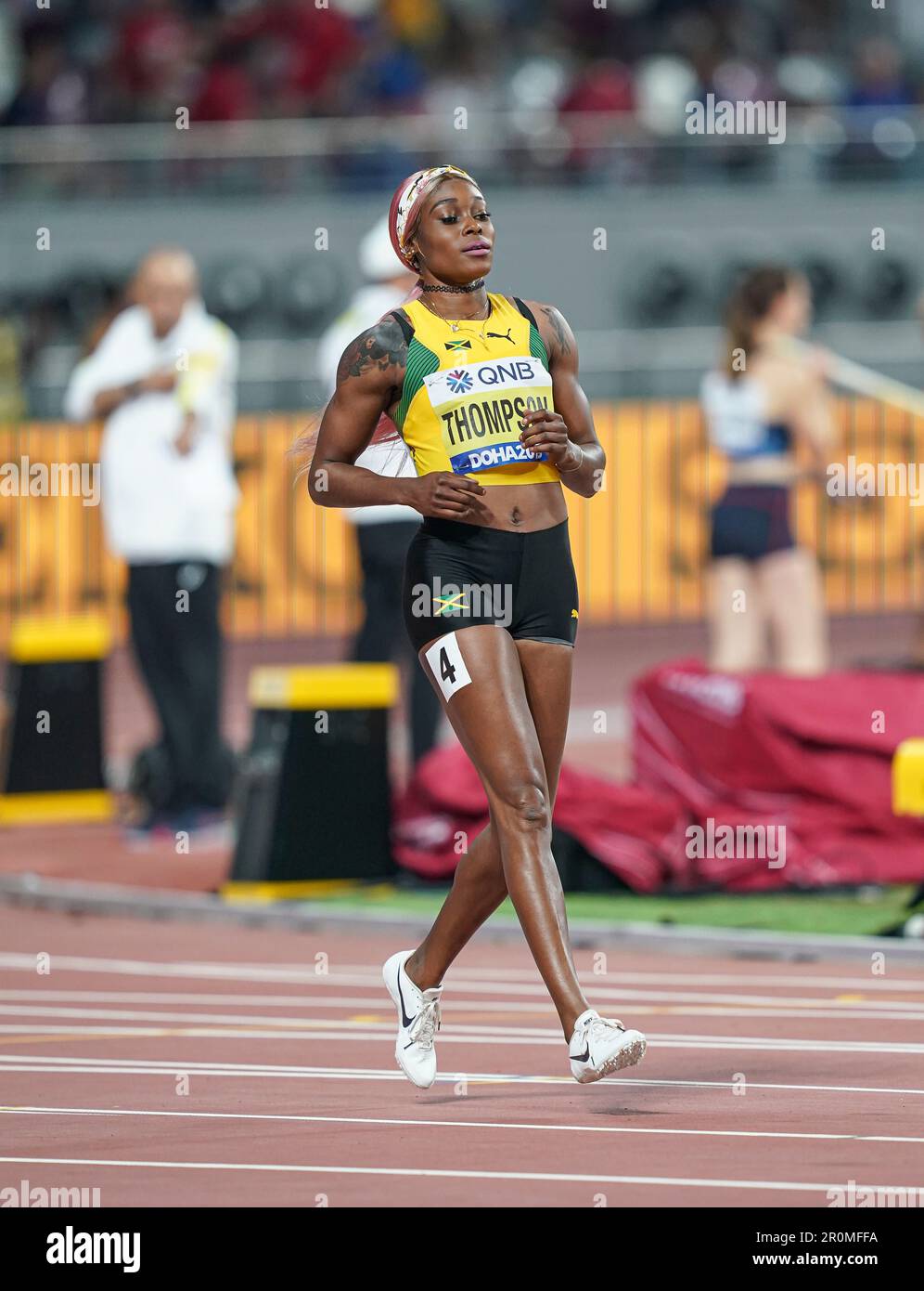 Elaine Thompson running the 100m at the 2019 World Athletics ...