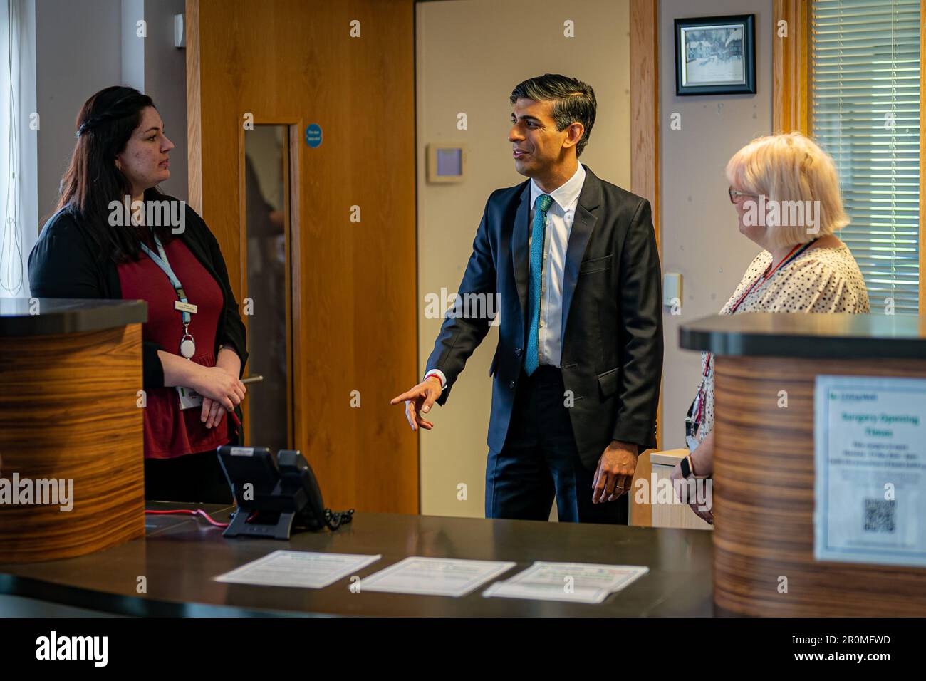 Prime Minister Rishi Sunak meet reception staff during a visit to a GP ...
