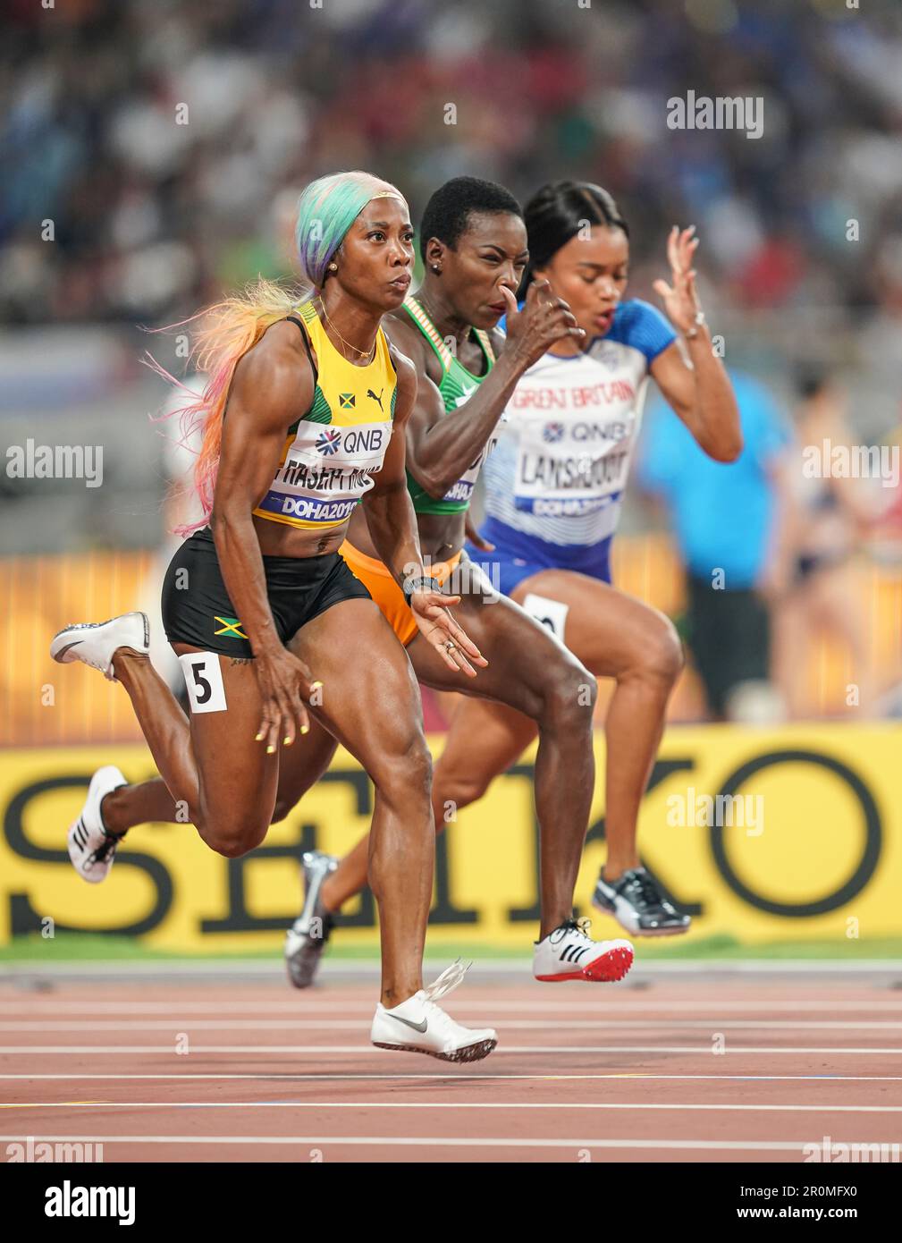 Shelly-Ann Fraser-Pryce running the 100m at the 2019 World Athletics ...