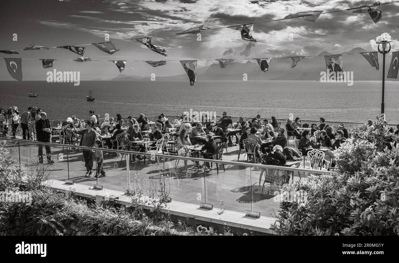 People sit under nationalistic bunting and enjoy panoramic views of the ...