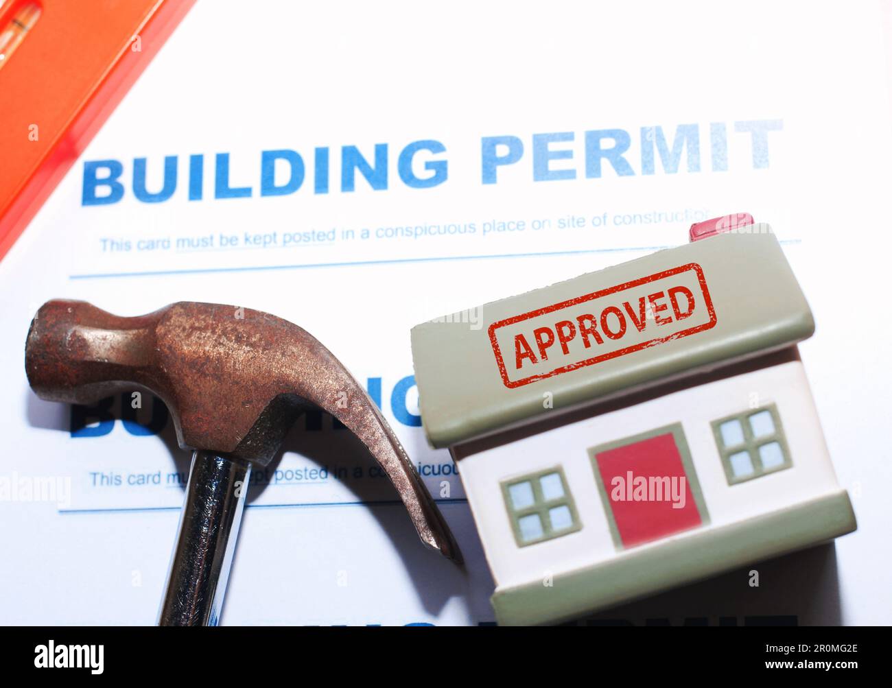 Building Permit concept with “approved” text on a residential home ...