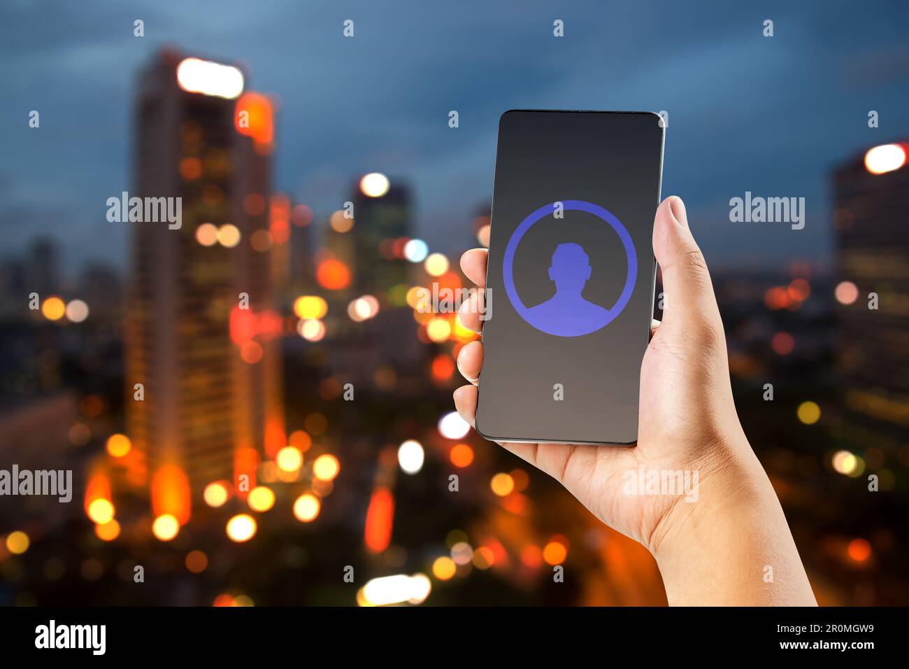 Human hands use mobile phones with photo profile icons on the screen ...