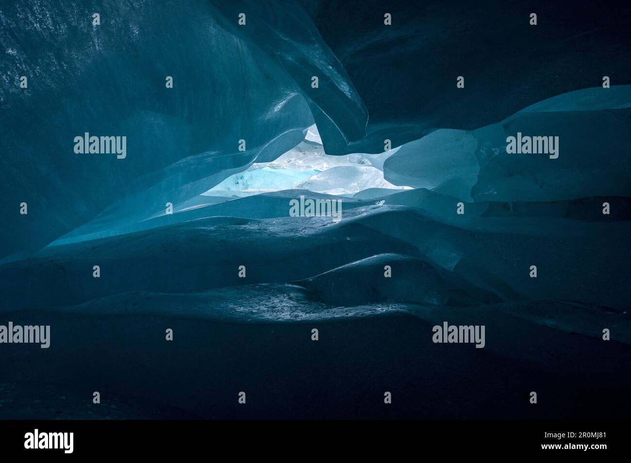 magical blue ice structures in a glacier cave in the Swiss Alps Stock ...