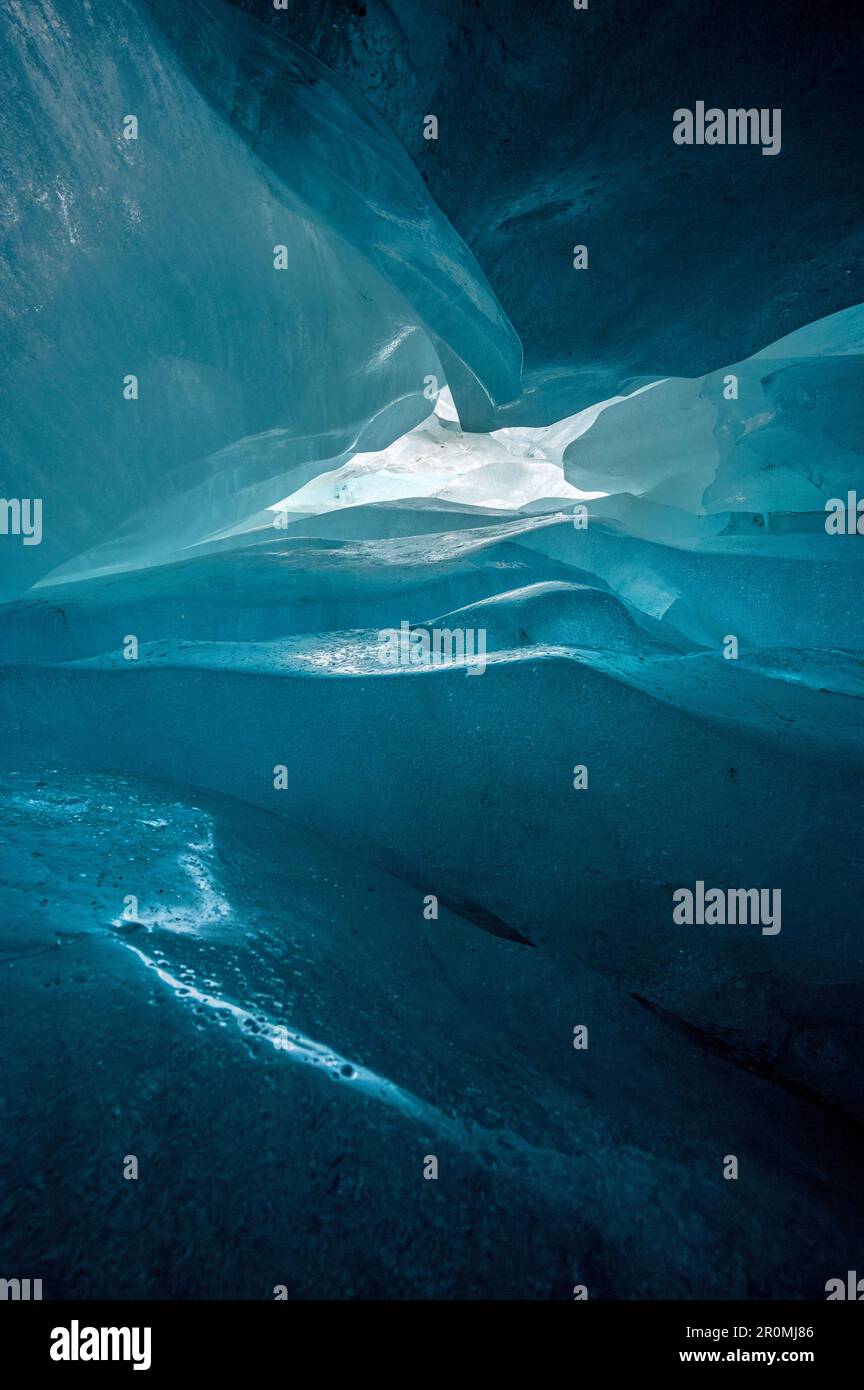 deep blue ice structure in a swiss ice cave in the Valais Alps Stock ...