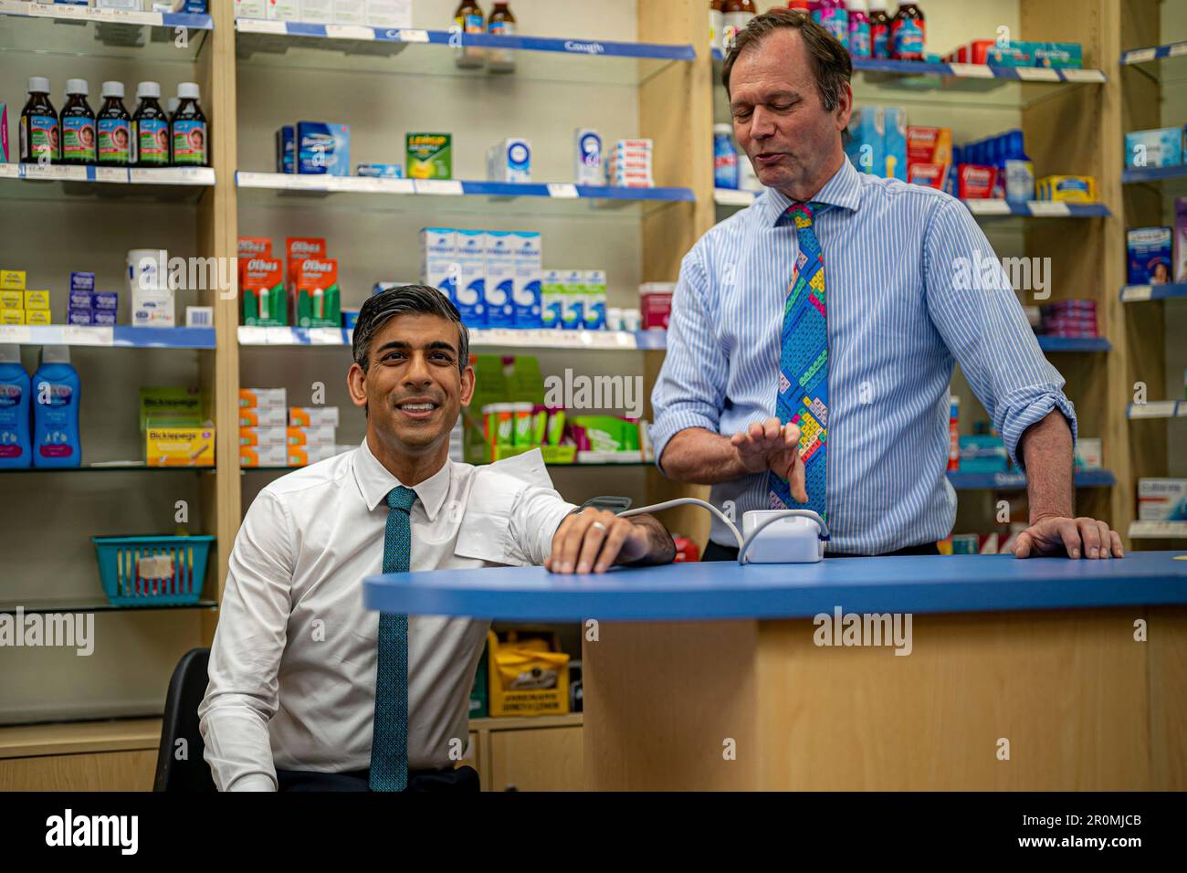 Britain's Prime Minister Rishi Sunak has his blood pressure checked by ...