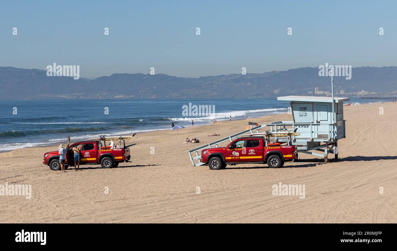 The Manhattan Beach life guard towers next to the pier in California ...