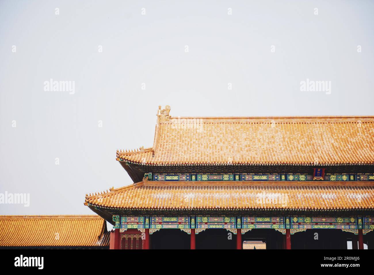 An ornate traditional Asian building with a detailed and intricate tile ...