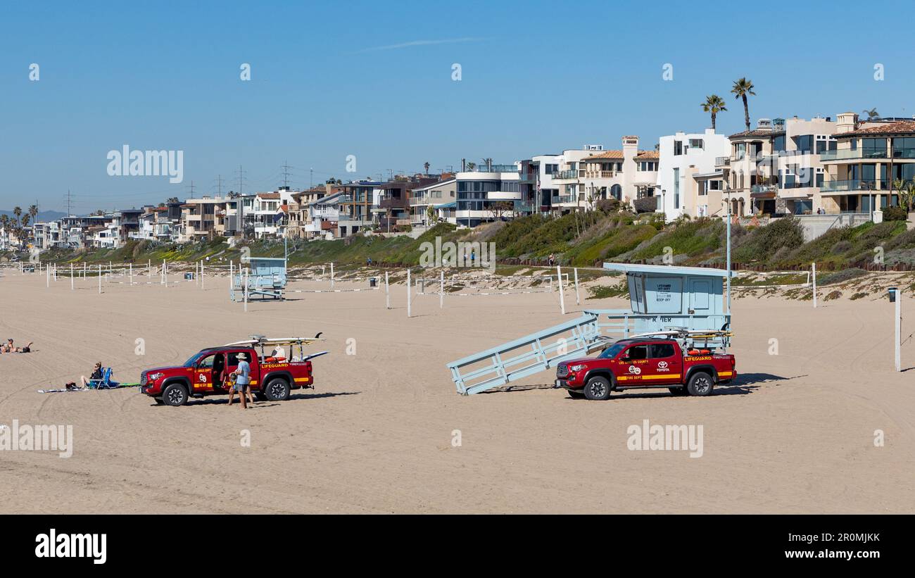 The Manhattan Beach life guard towers next to the pier in California ...