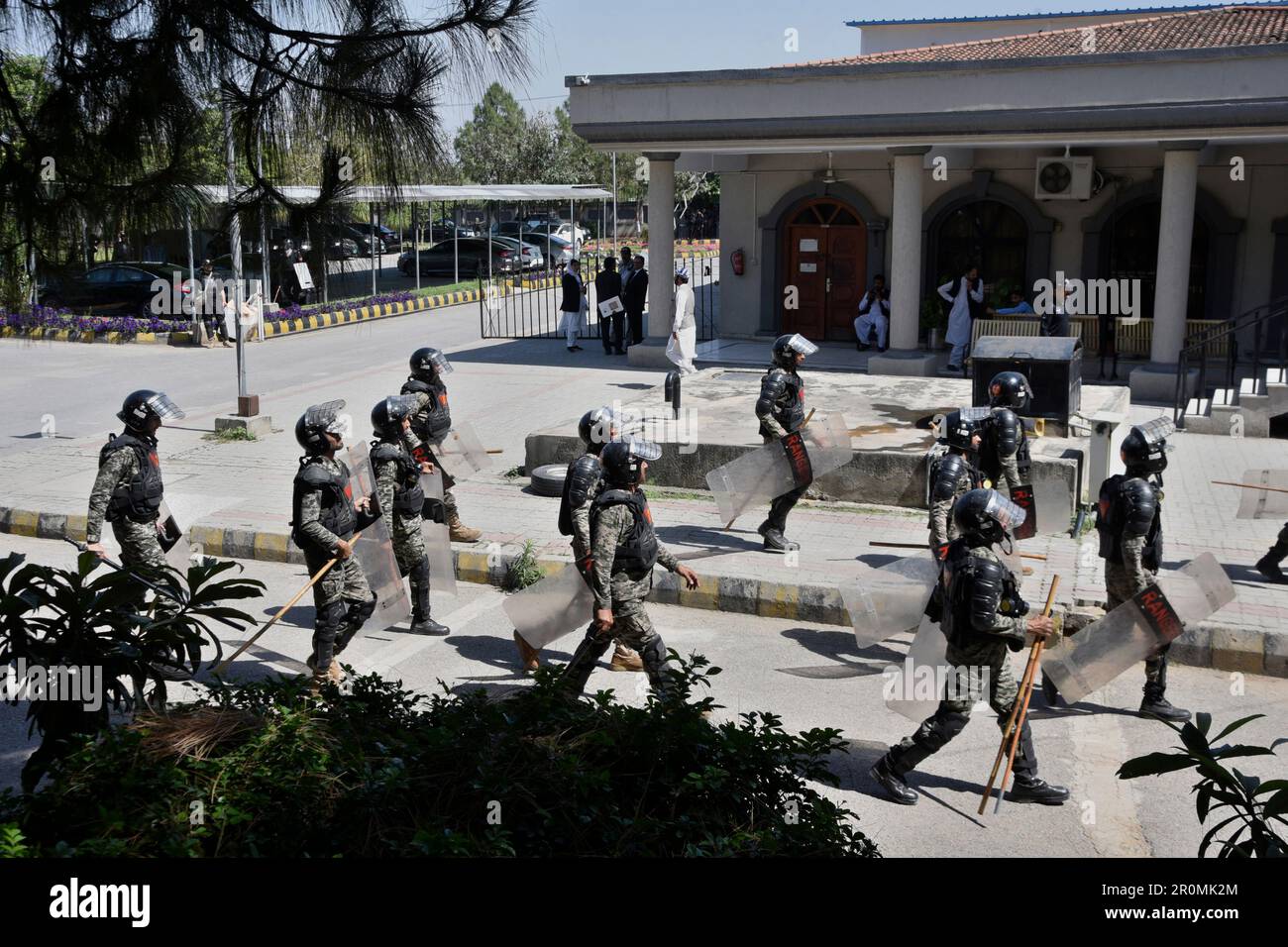 Pakistani paramilitary troops walks in a court, where Pakistan's former ...