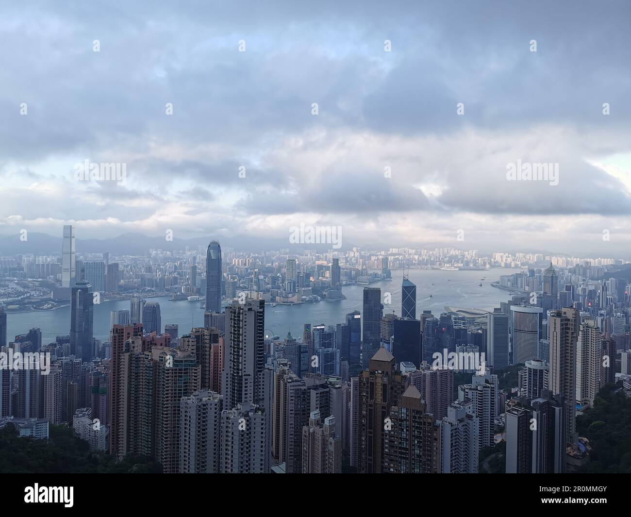 Hong Kong Filled with dense high-rise buildings, and the port appears ...