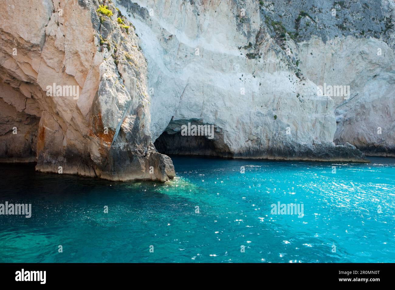 Cliffs and caves at the sparsely populated western coast of Zakynthos ...