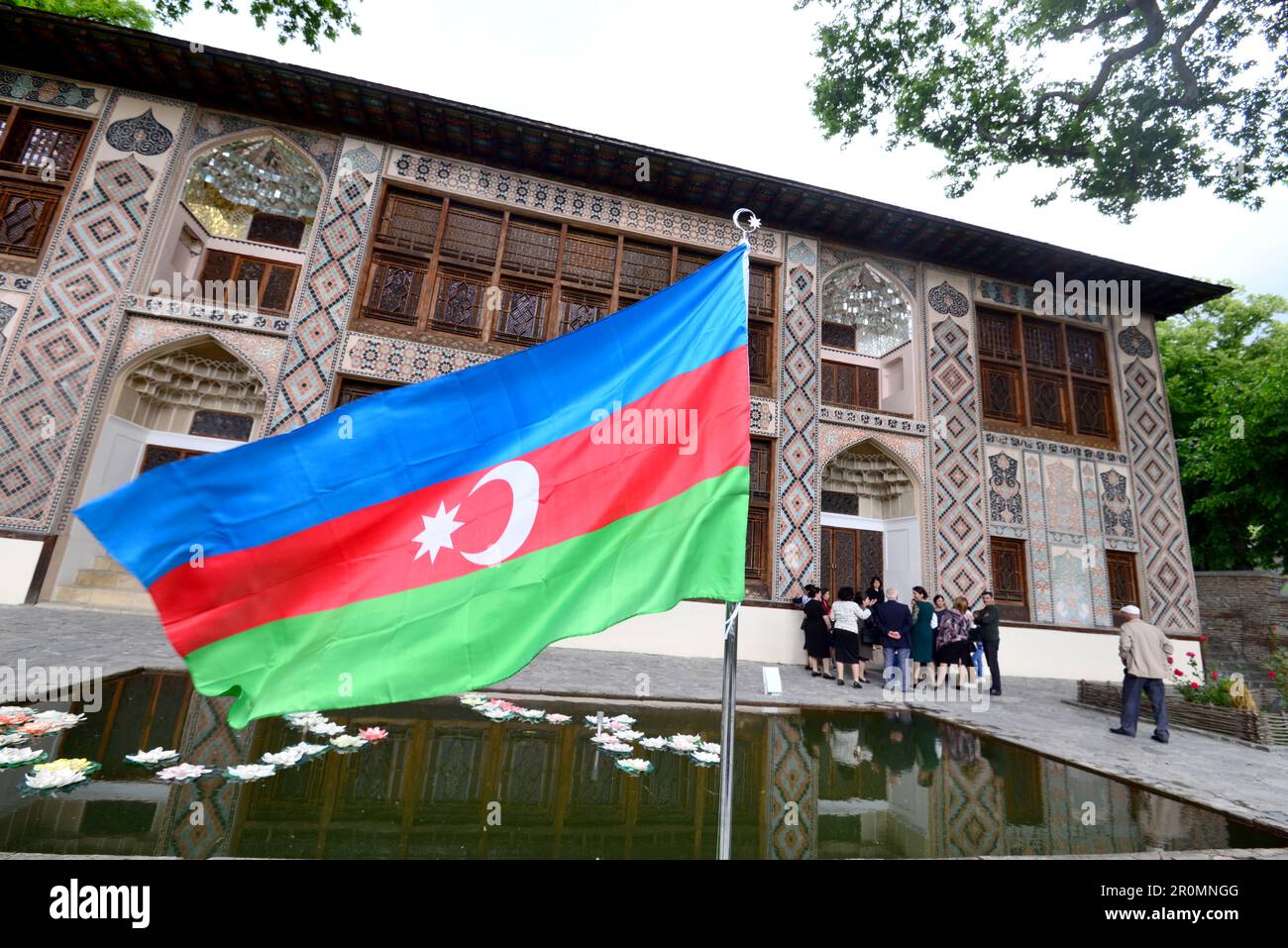 Flag of Azerbaijan and facade of the historic Xan Sarayi Fortress in ...