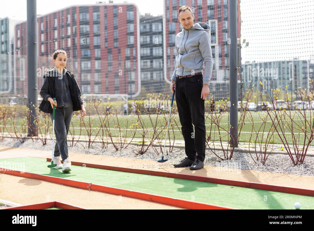 Mini-golf ball on artificial grass. Summer season game Stock Photo - Alamy