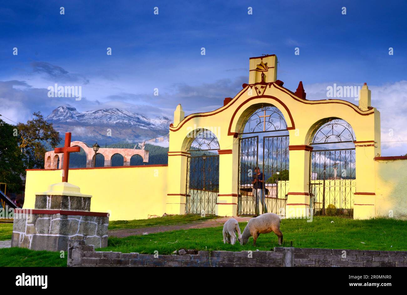 Gekbes entrance gate and 2 sheep at a village church at volcano ...
