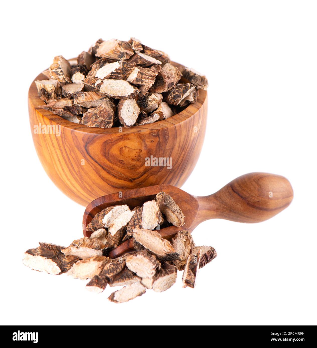 Calamus root in wooden bowl and spoon, isolated on white background ...