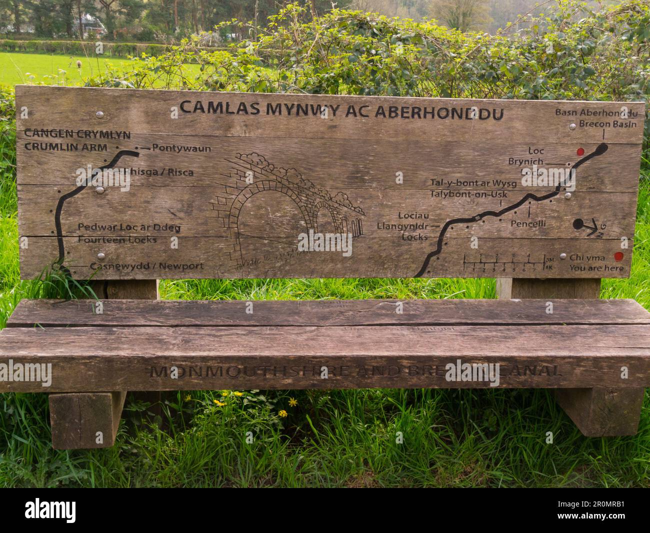 Carved seat showing map of Crumlin Arm to Brecon Basin on towpath of ...