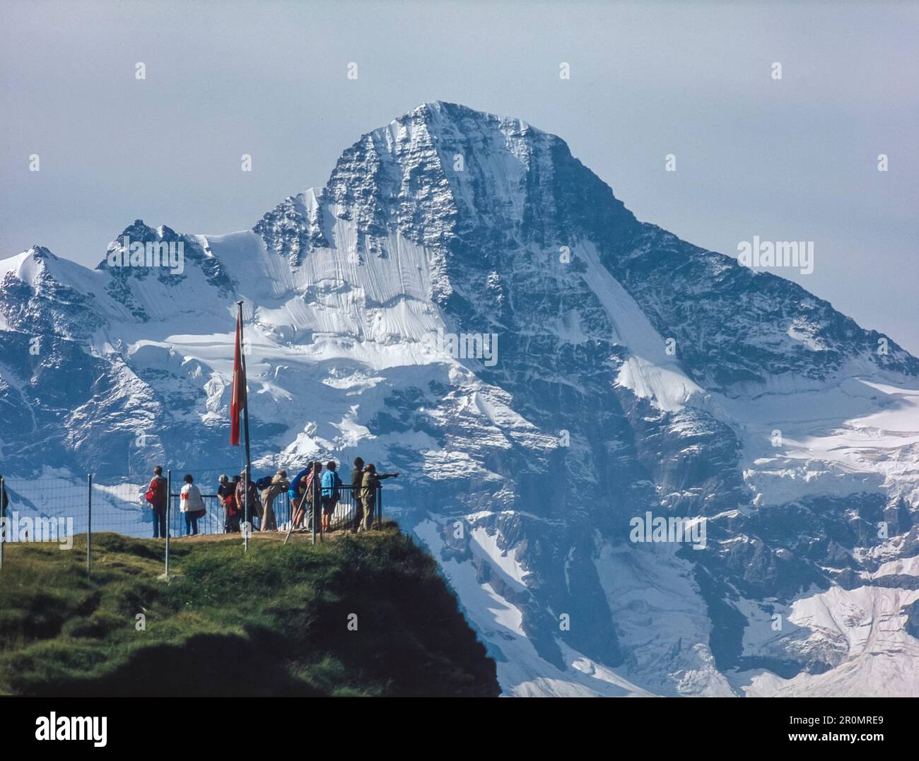 Tourists at the at the overlook view point above the the alpine resort ...