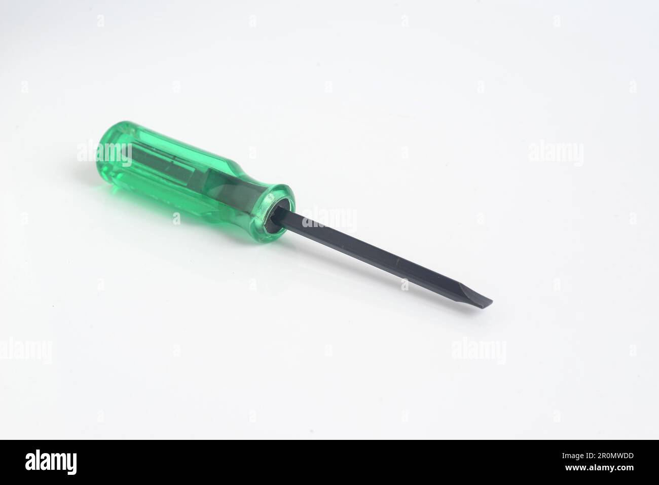 Common screwdriver on white background Stock Photo - Alamy